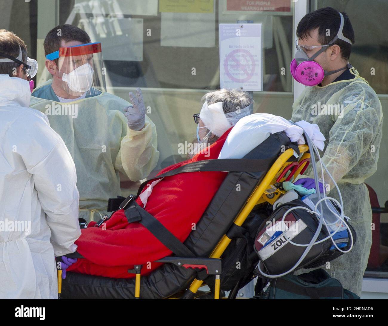 First responders triage a patient to the emergency unit at the Verdun ...