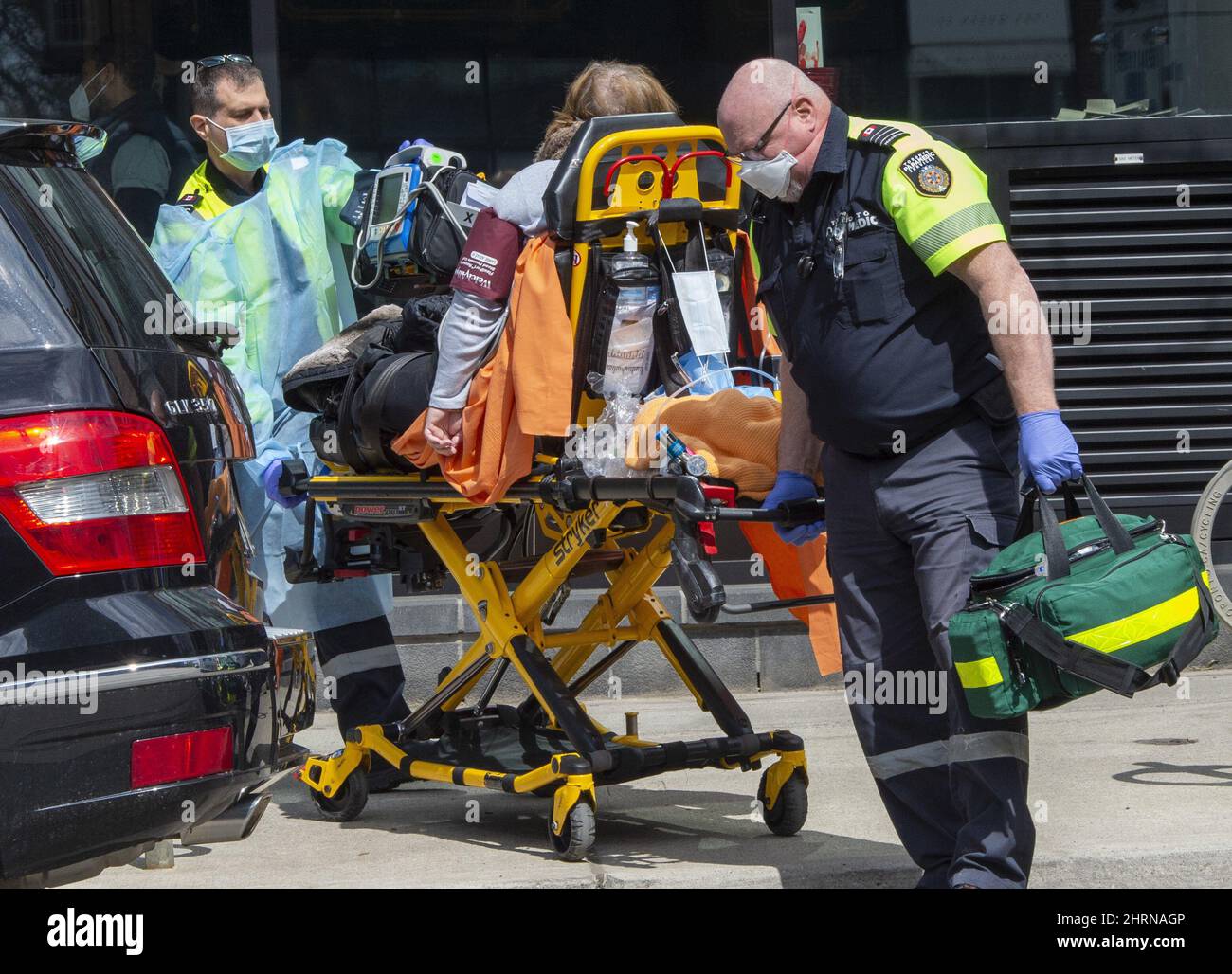 Toronto Paramedics transport a patient from a LCBO store in Toronto on ...