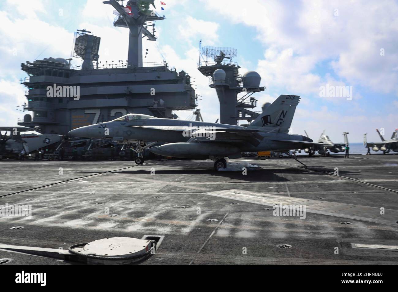 PHILIPPINE SEA (Feb. 24, 2022) Rear Admiral J.T. Anderson, commander, Carrier Strike Group 3 ...