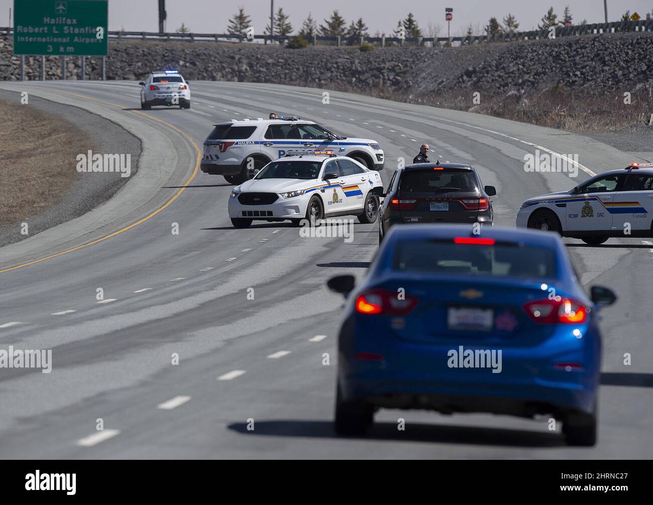 Police block the highway in Enfield, N.S. on Sunday, April 19, 2020 ...