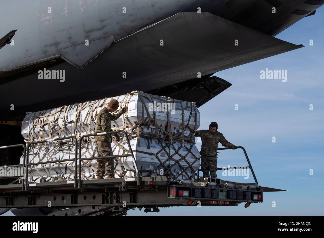 Senior Airman Adam Pomfret and Airman First Class Cecil Nielsen, both ...