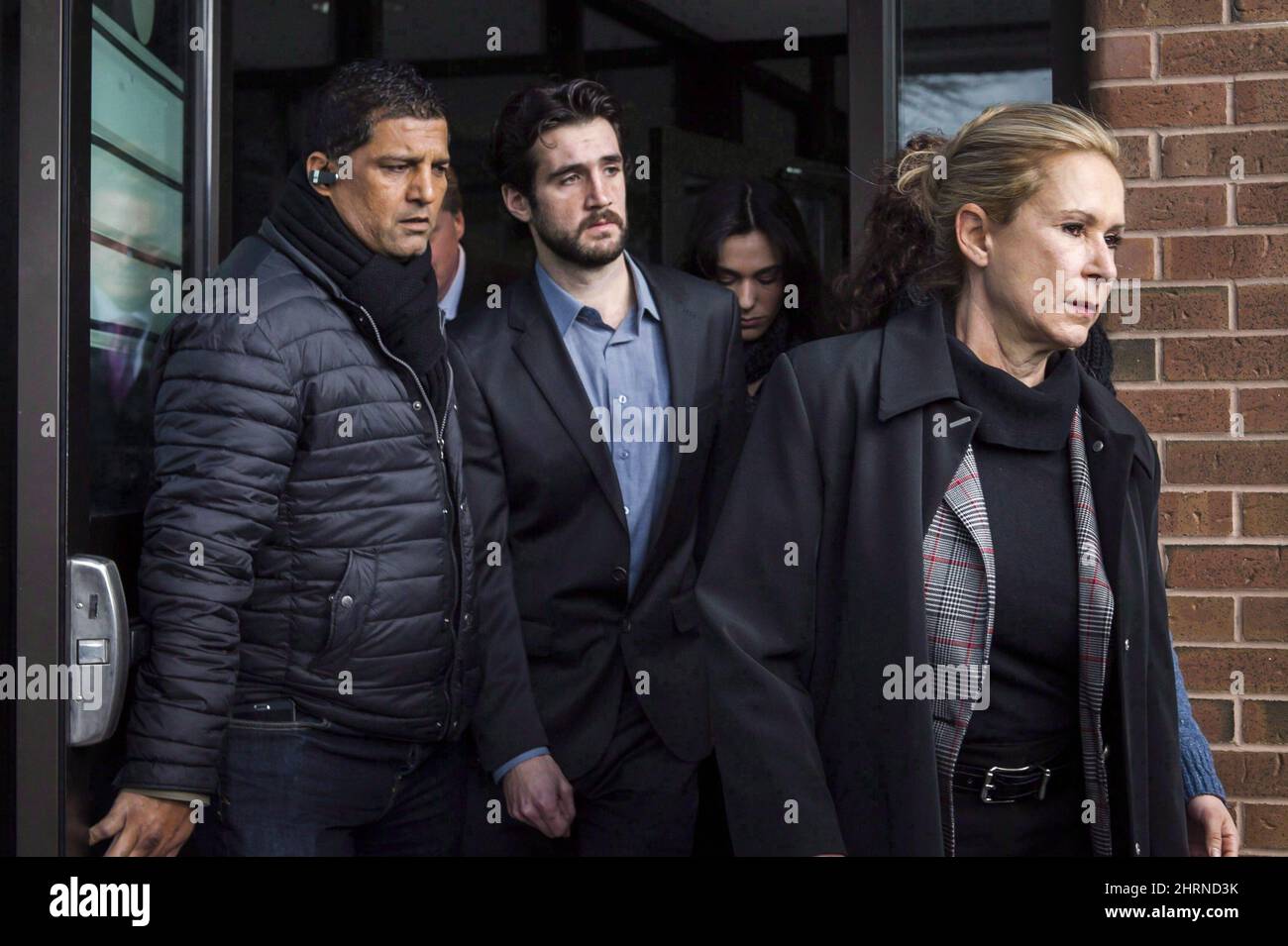 Marco Muzzo, centre, leaves the Newmarket courthouse surrounded by ...