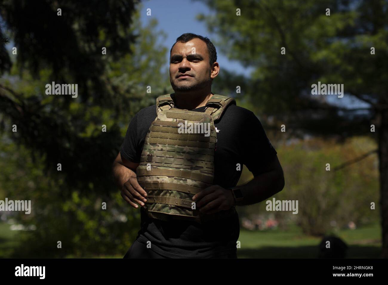 Crossfit enthusiast David Rios is pictured wearing his weighted vest ...