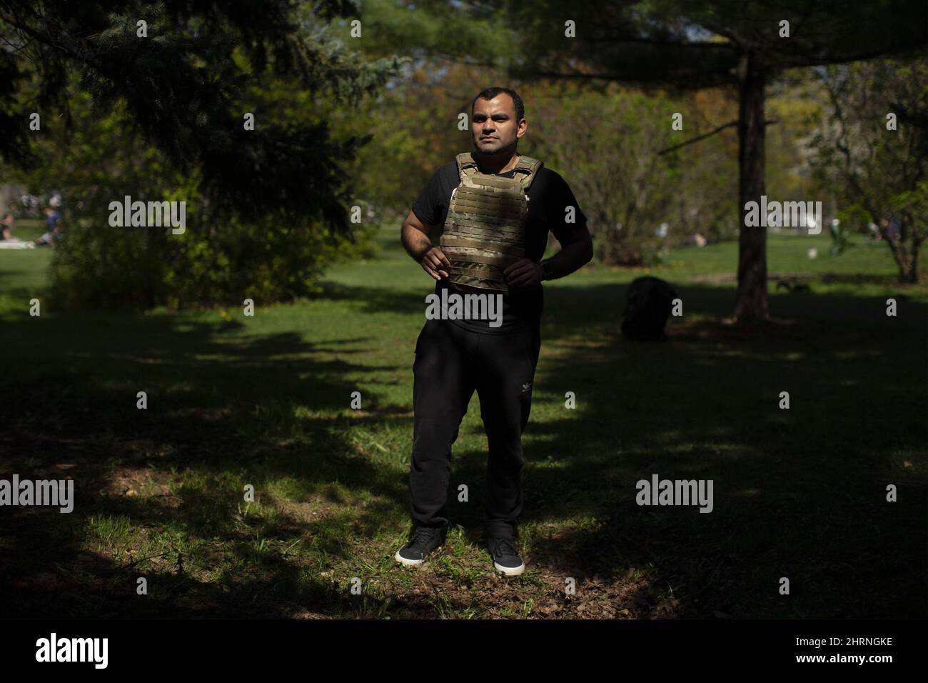 Crossfit enthusiast David Rios is pictured wearing his weighted vest ...