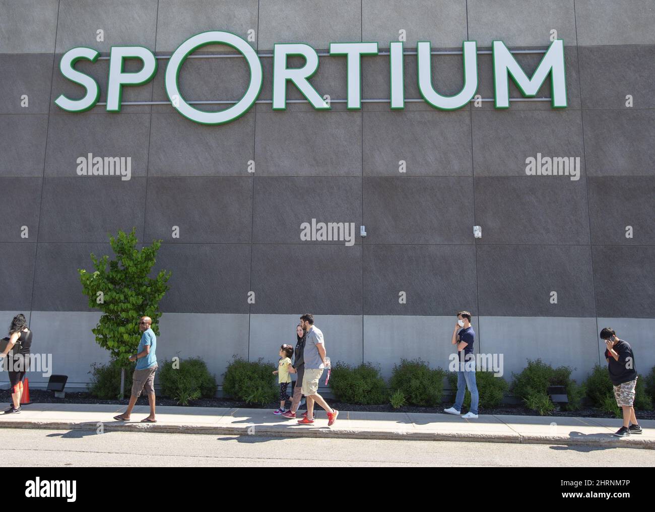 Customers lineup at a Sportium store Friday, June 5, 2020 in Laval, Que ...