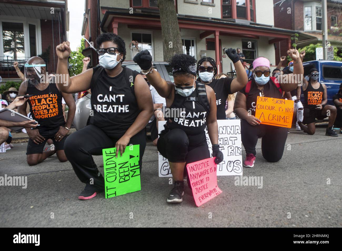 Protesters gather before an anti-racism rally in Toronto , on Saturday ...