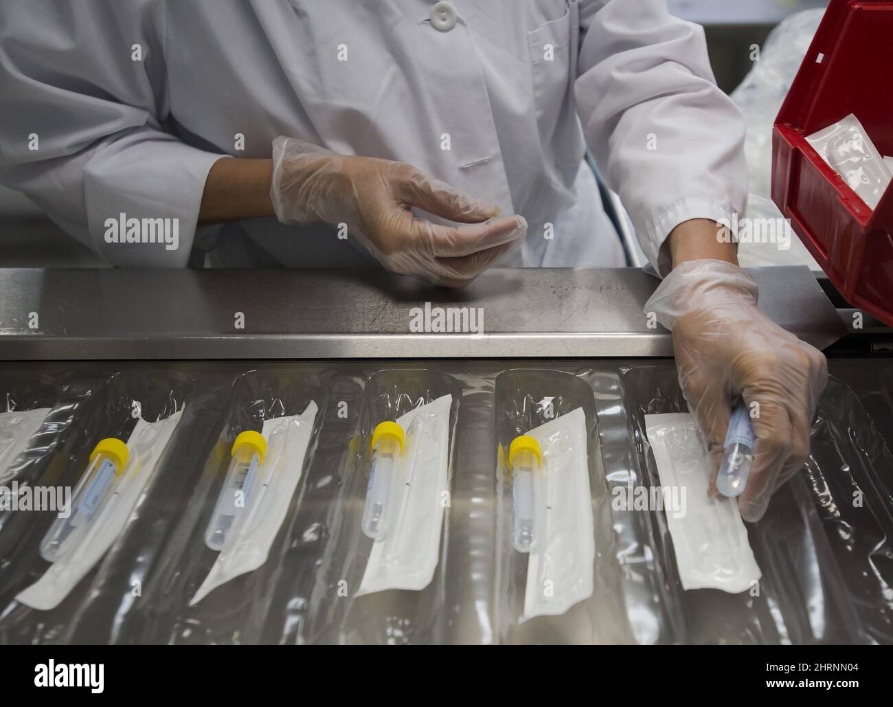 Employees work at the Canadian Hospital Specialities (CHS) helping take ...