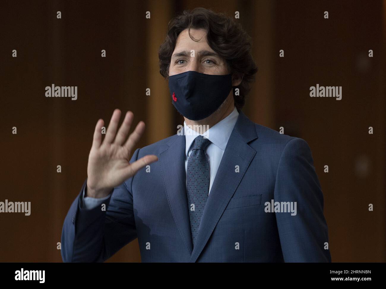 Prime Minister Justin Trudeau waves as he leaves an event where he ...