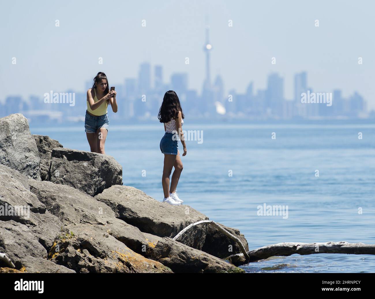 People enjoy activities on Lake Ontario overlooking the City of Toronto ...