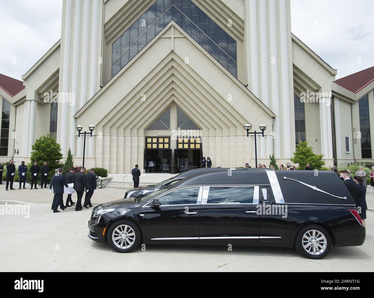The caskets of Karolina Ciasullo and her three young daughters, six ...