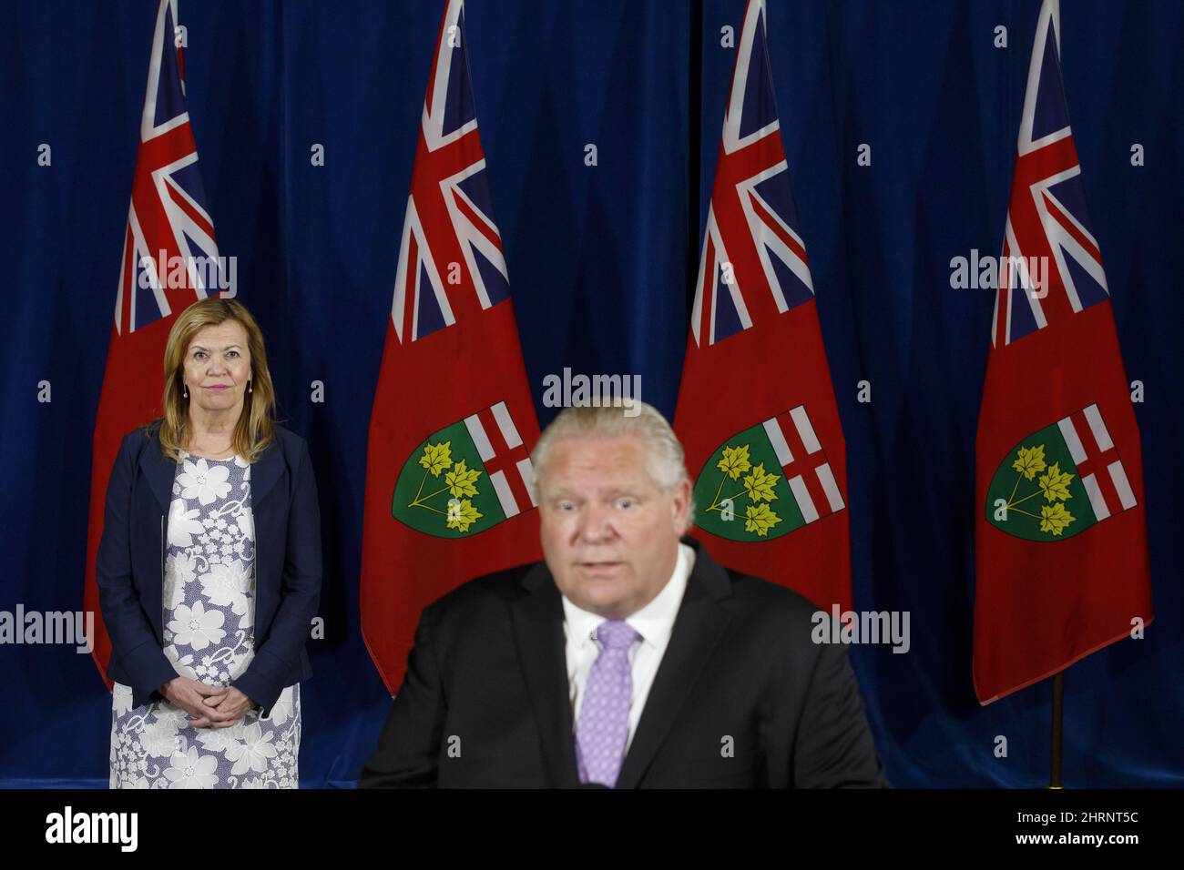 Ontario Minister of Health Christine Elliott looks on as Ontario ...