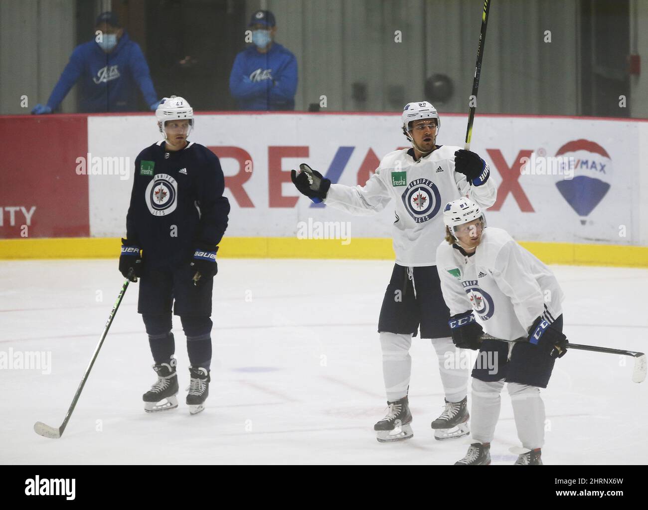 Winnipeg Jets' Mark Scheifele (55) gestures to his teammates as Nikolaj ...