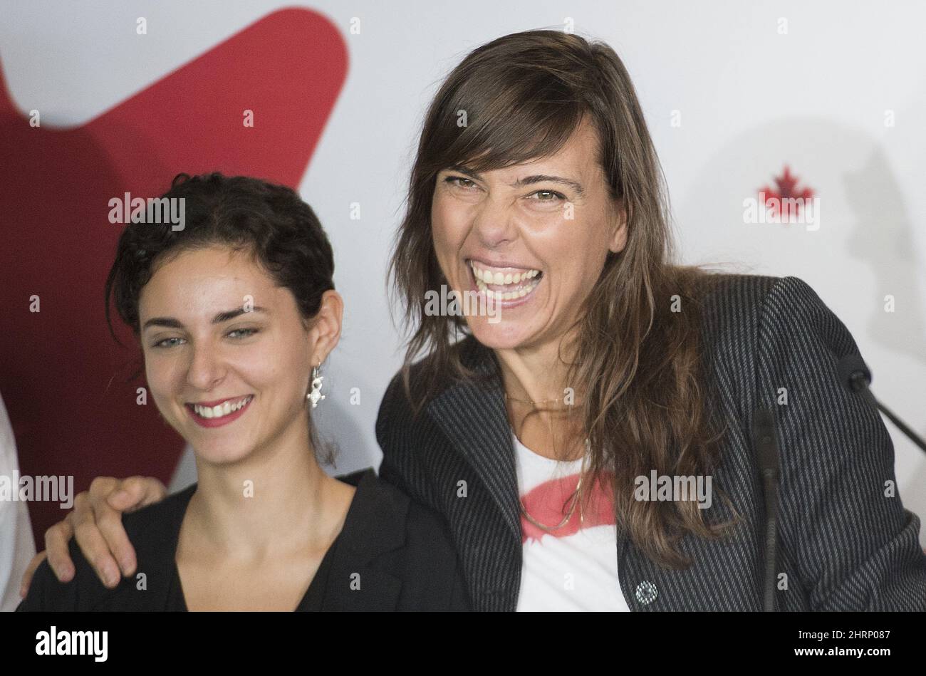 Director of "Antigone" Sophie Deraspe, right, smiles alongside actress ...