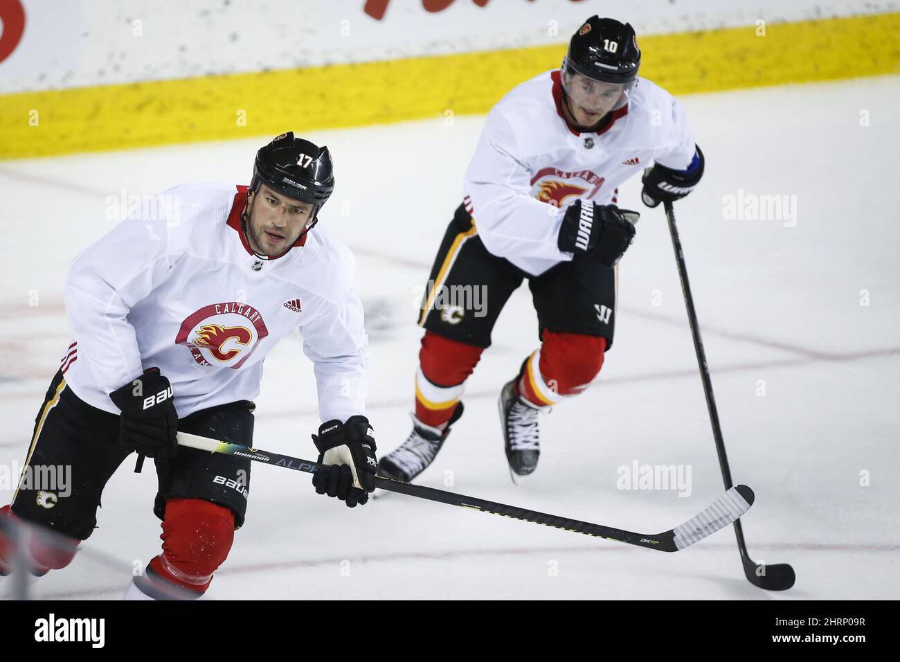 Calgary Flames' Milan Lucic, left, and Derek Ryan skate during team ...