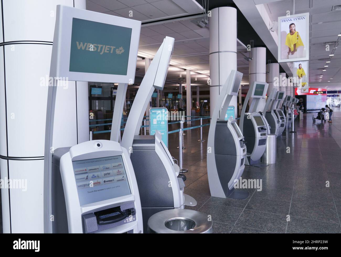WestJet self service check-in kiosks are seen at Montreal-Trudeau ...
