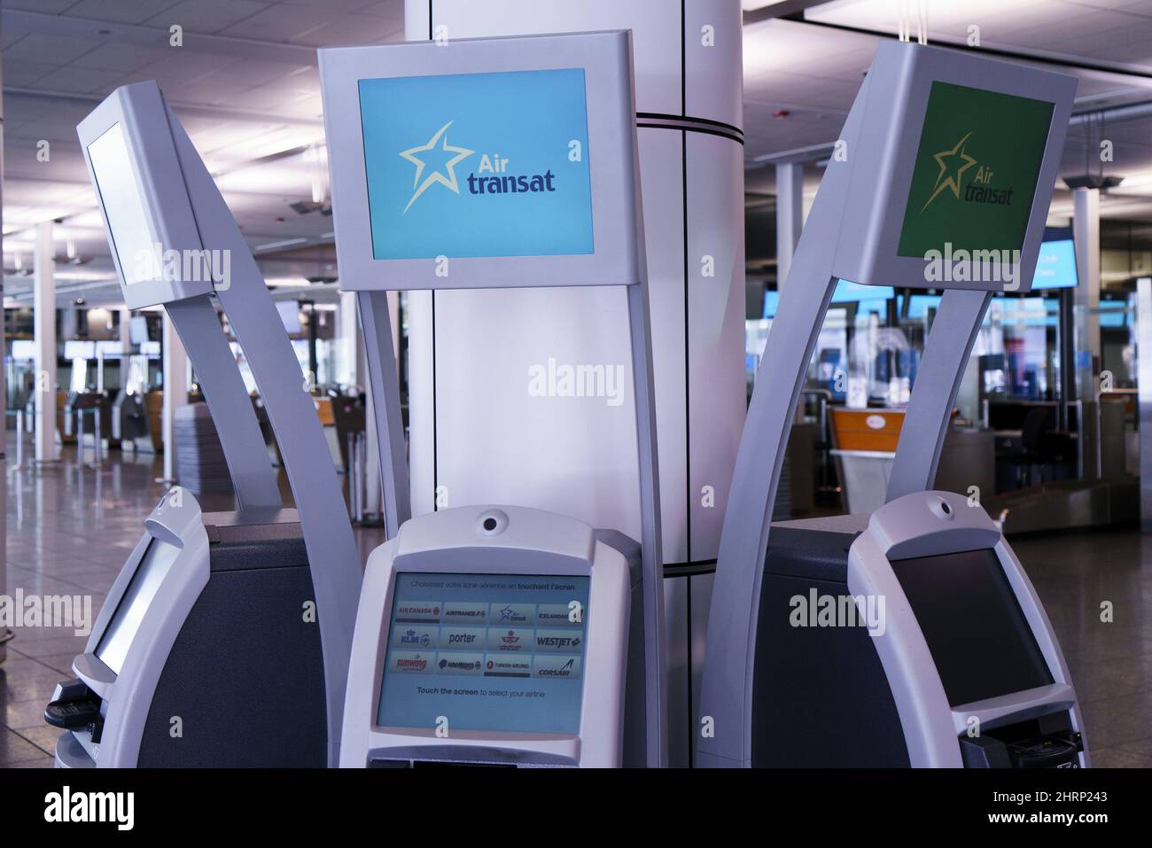Air Transat self service check-in kiosks are seen at Montreal-Trudeau ...