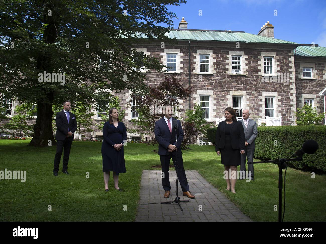 Andrew Parsons, left to right, Sarah Stoodley, Premier Andrew Furey ...