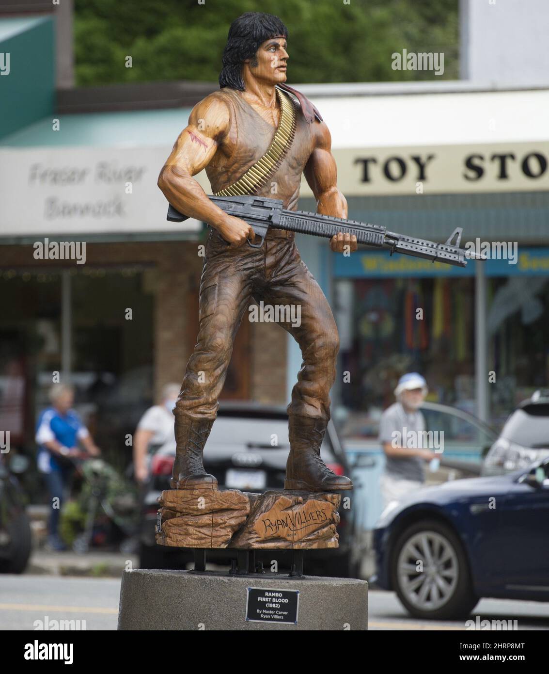 A life size chainsaw statue of Sylvester Stallone as Rambo in downtown ...