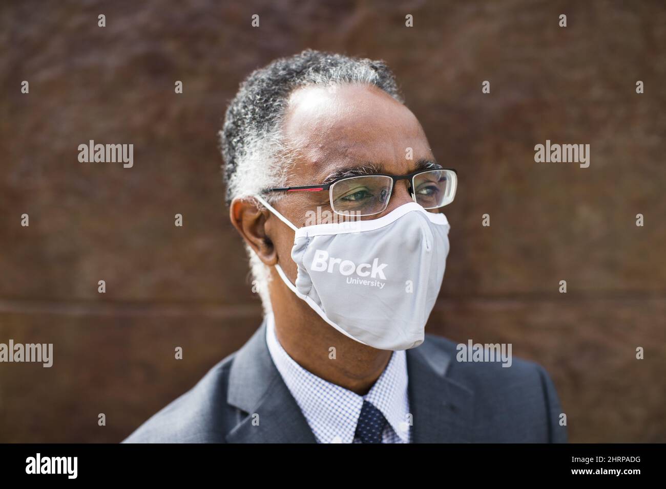Brock University President Gervan Fearon wears a Brock mask on campus ...