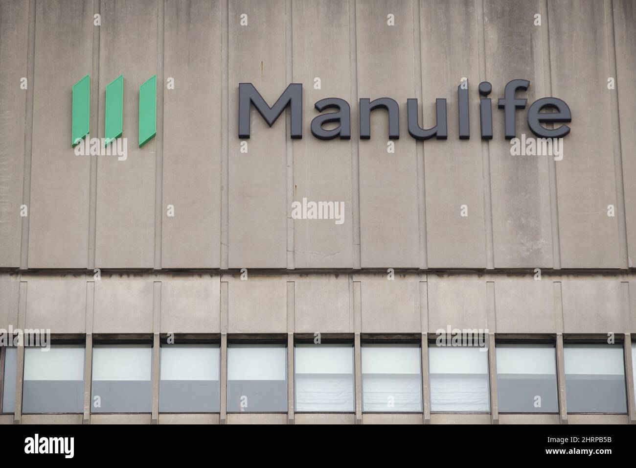 Signage is seen on Manulife Financial Corp.'s office tower in Toronto ...