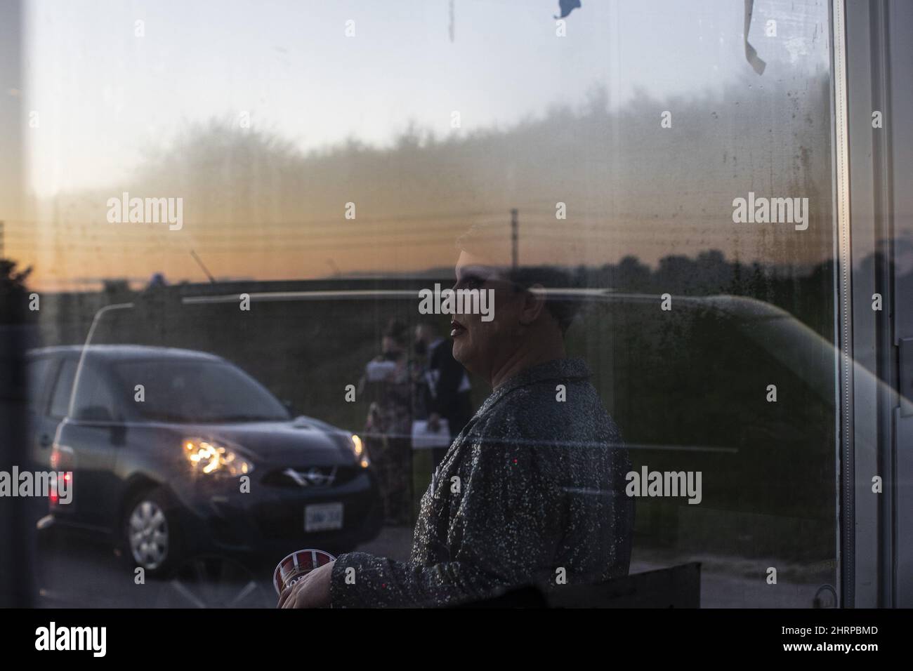 Drag Queen Miss Conception watches ticket holders arrive at Drive In ...