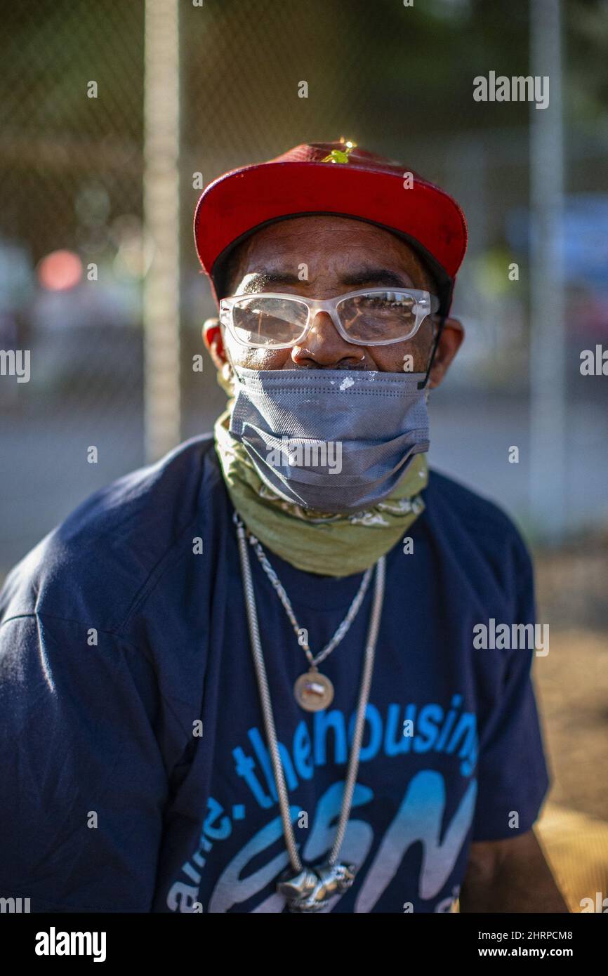 Derrick Black poses for a portrait at a homeless encampment in Toronto ...