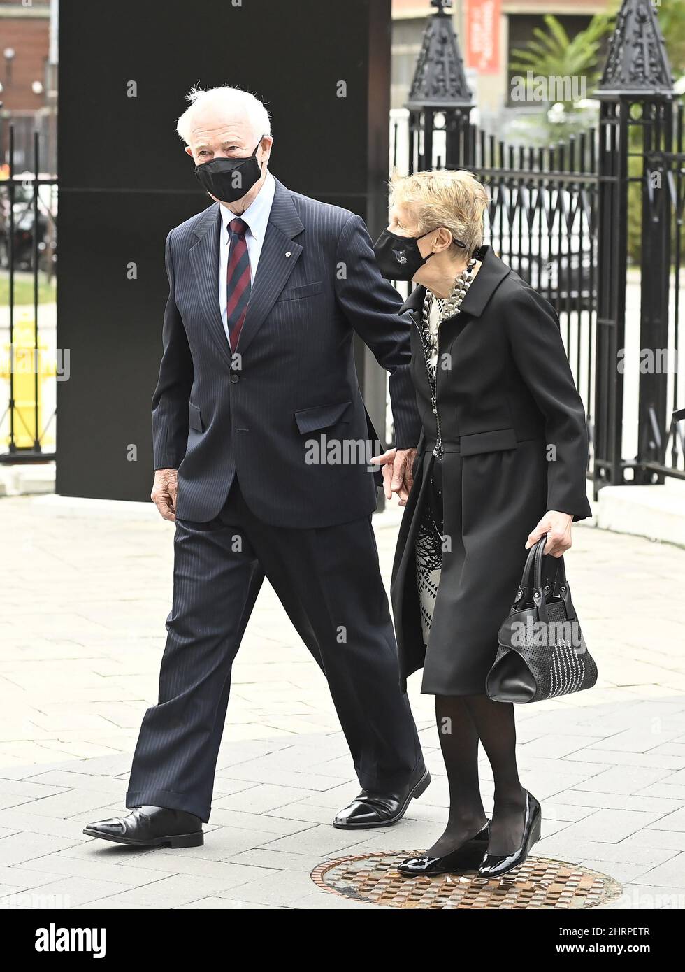 Former governor-general David Johnston and his wife Sharon arrive for the state funeral service ...
