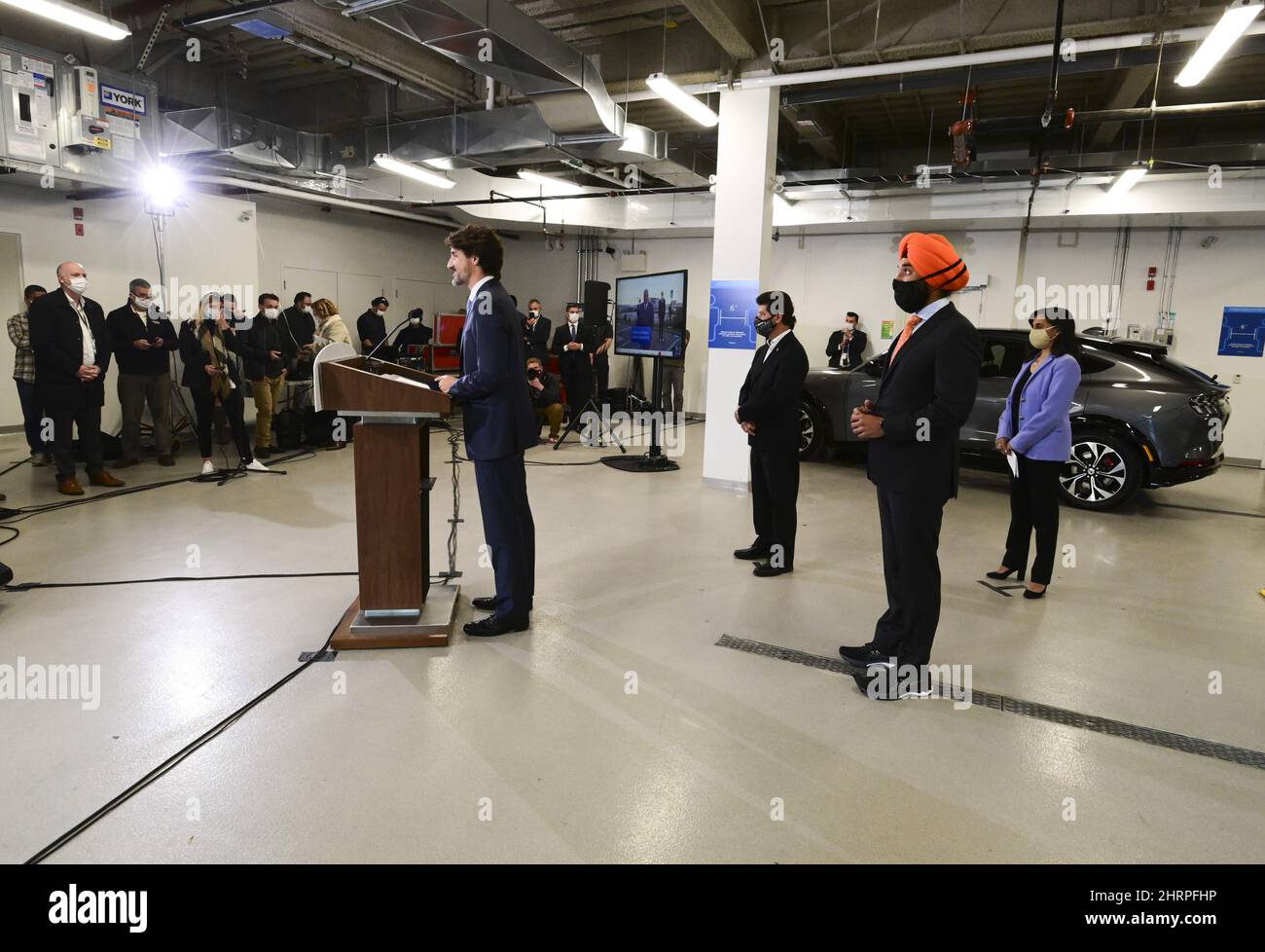 Prime Minister Justin Trudeau, let to right, speaks as he is joined by ...