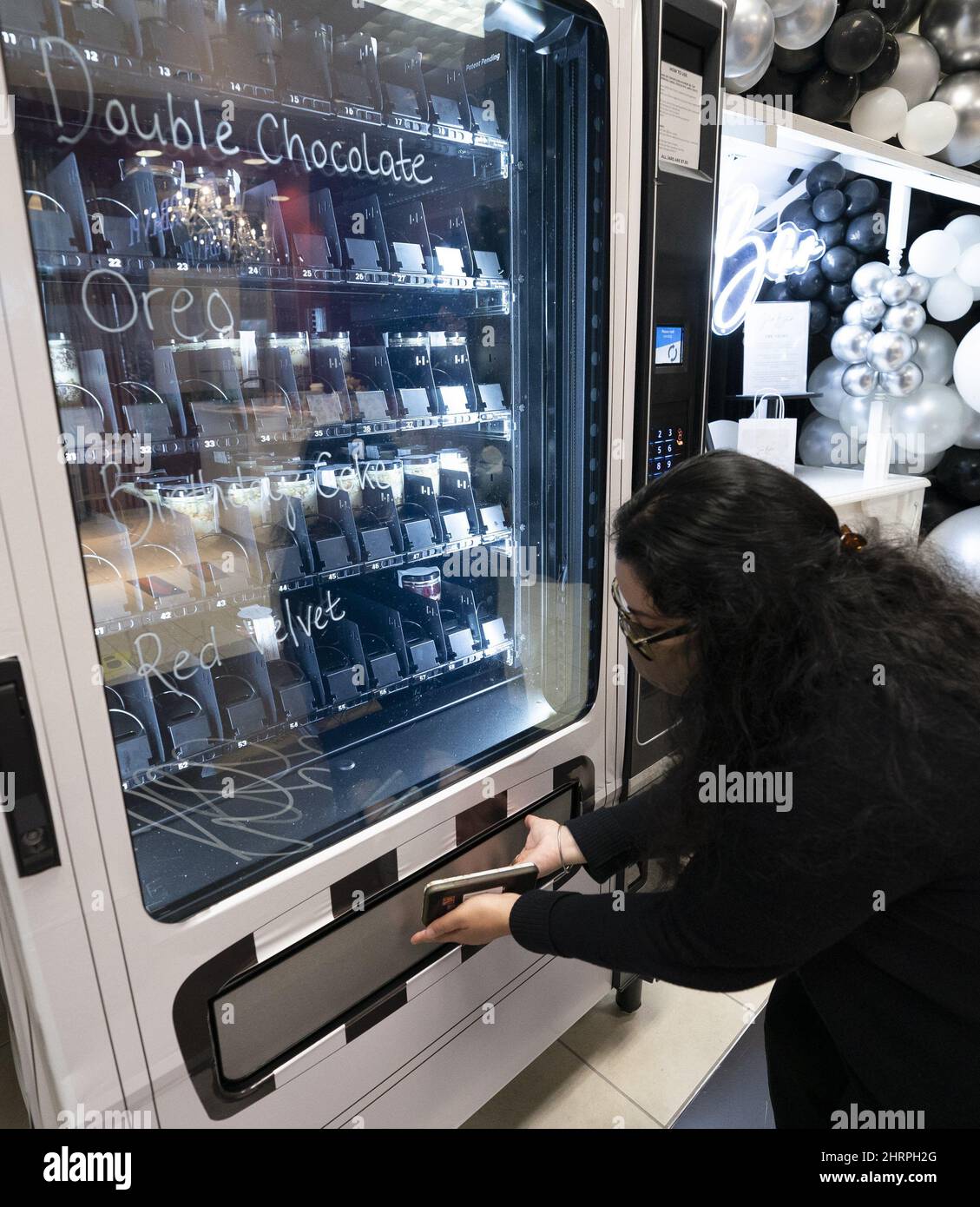 A customer purchases a cake in a jar, from the Jar Bar, CanadaÃ•s first ...