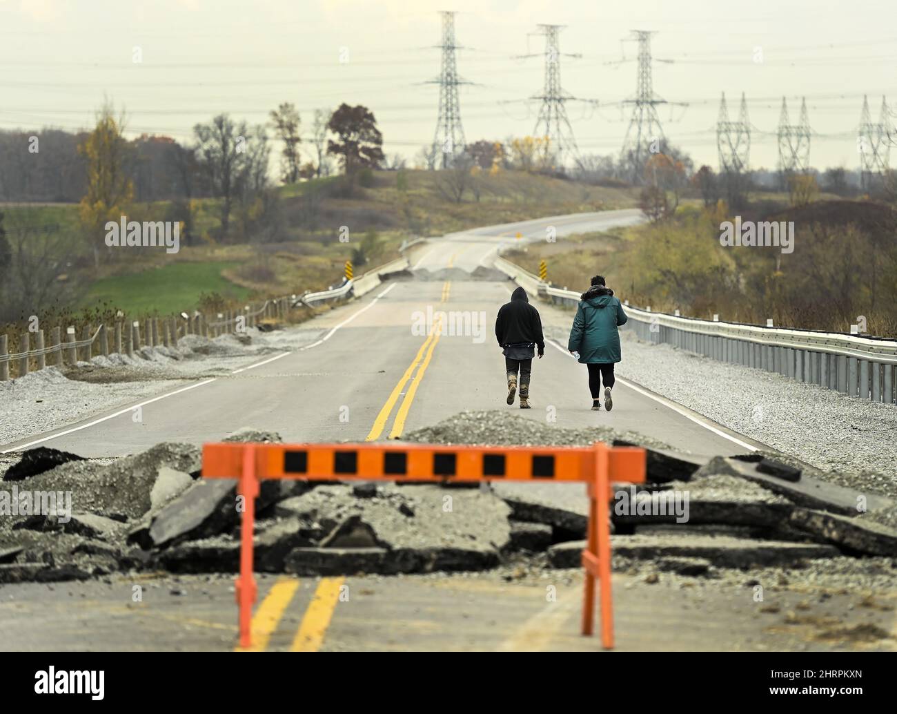 Kahsenniyo Williams, right, walks to do a poem reading near the ...