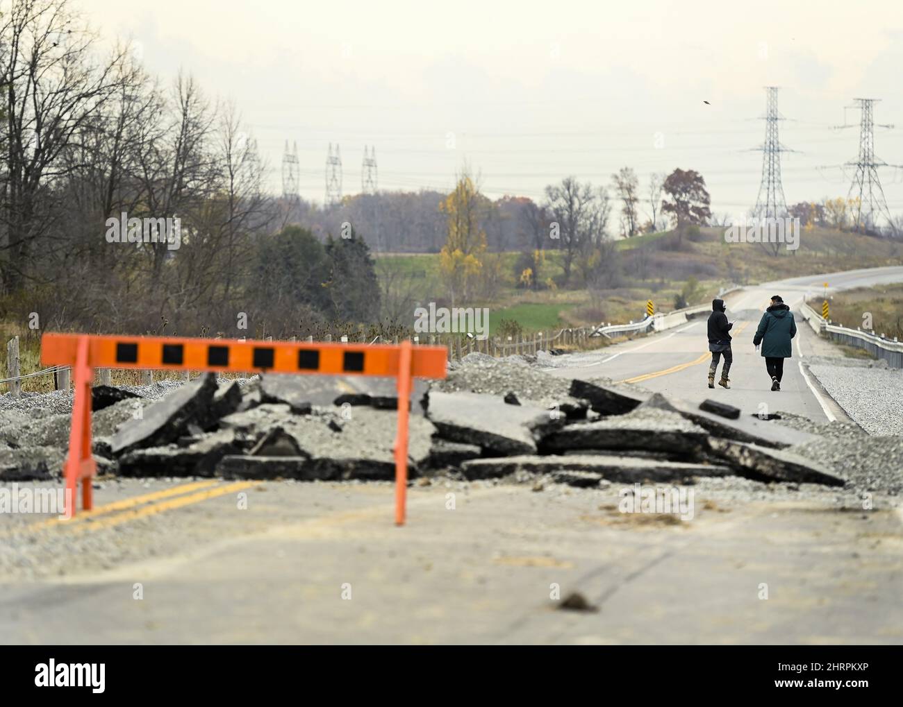 Kahsenniyo Williams, right, walks to do a poem reading near the ...
