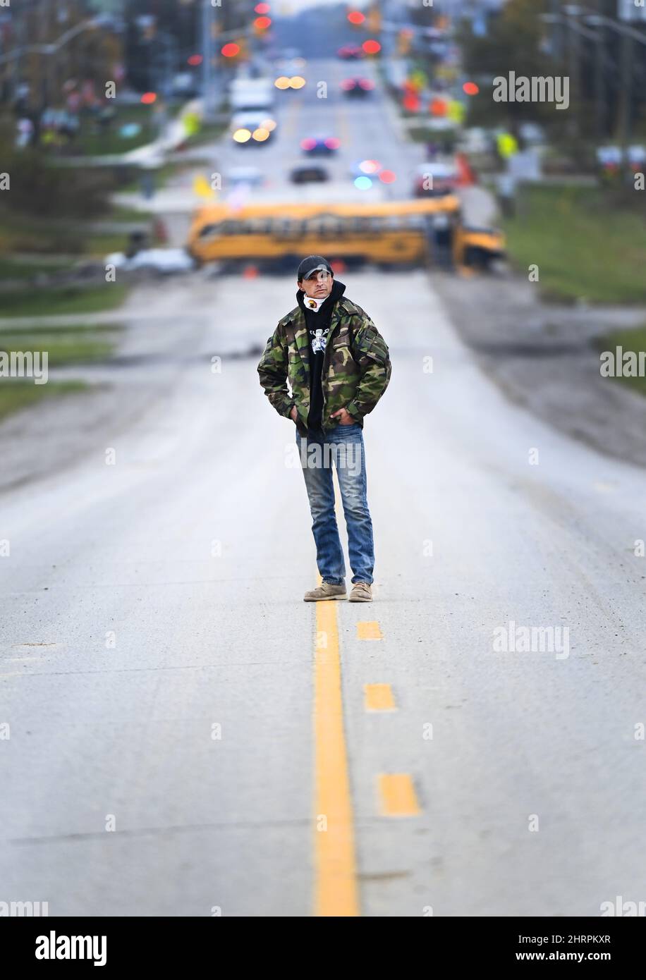 Mohawk Skyler Williams poses for a photograph near the construction ...