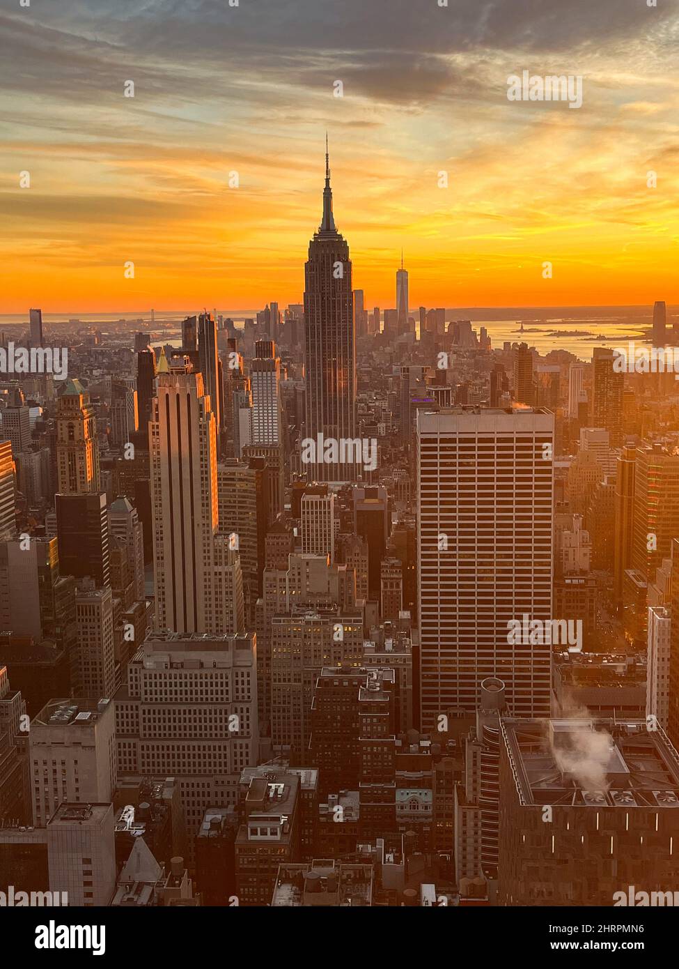 Modern cityscape during sunset Stock Photo - Alamy