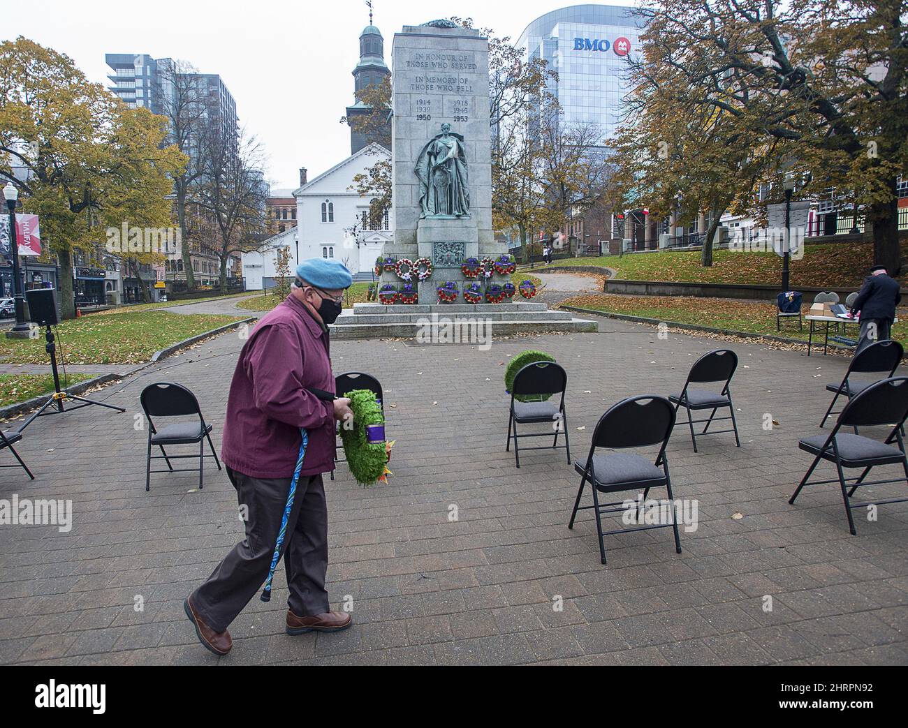 A veteran arrives to place a wreath at Remembrance Day ceremonies at ...