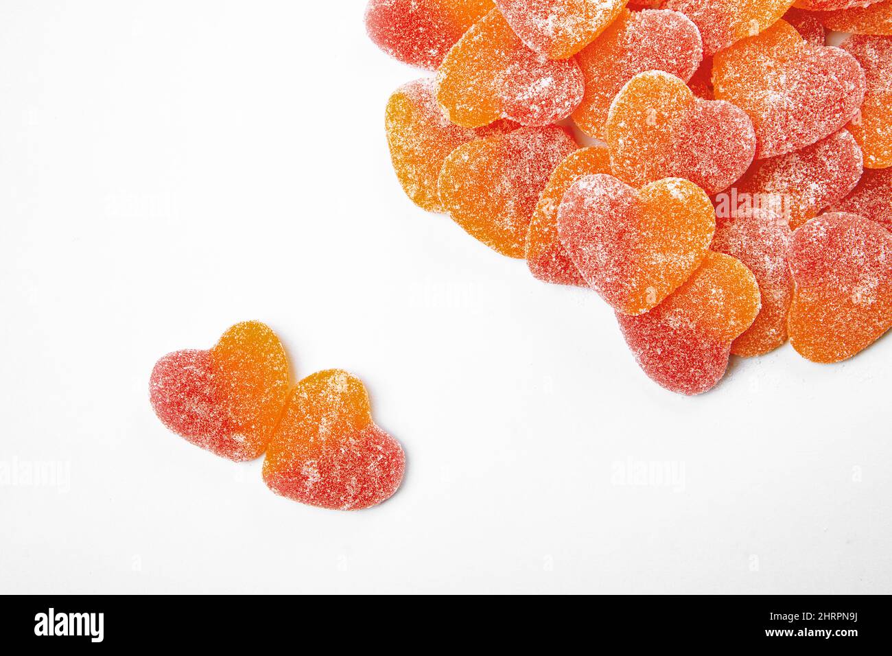 Flat lay of gummy heart candies on white background. Valentine's day ...