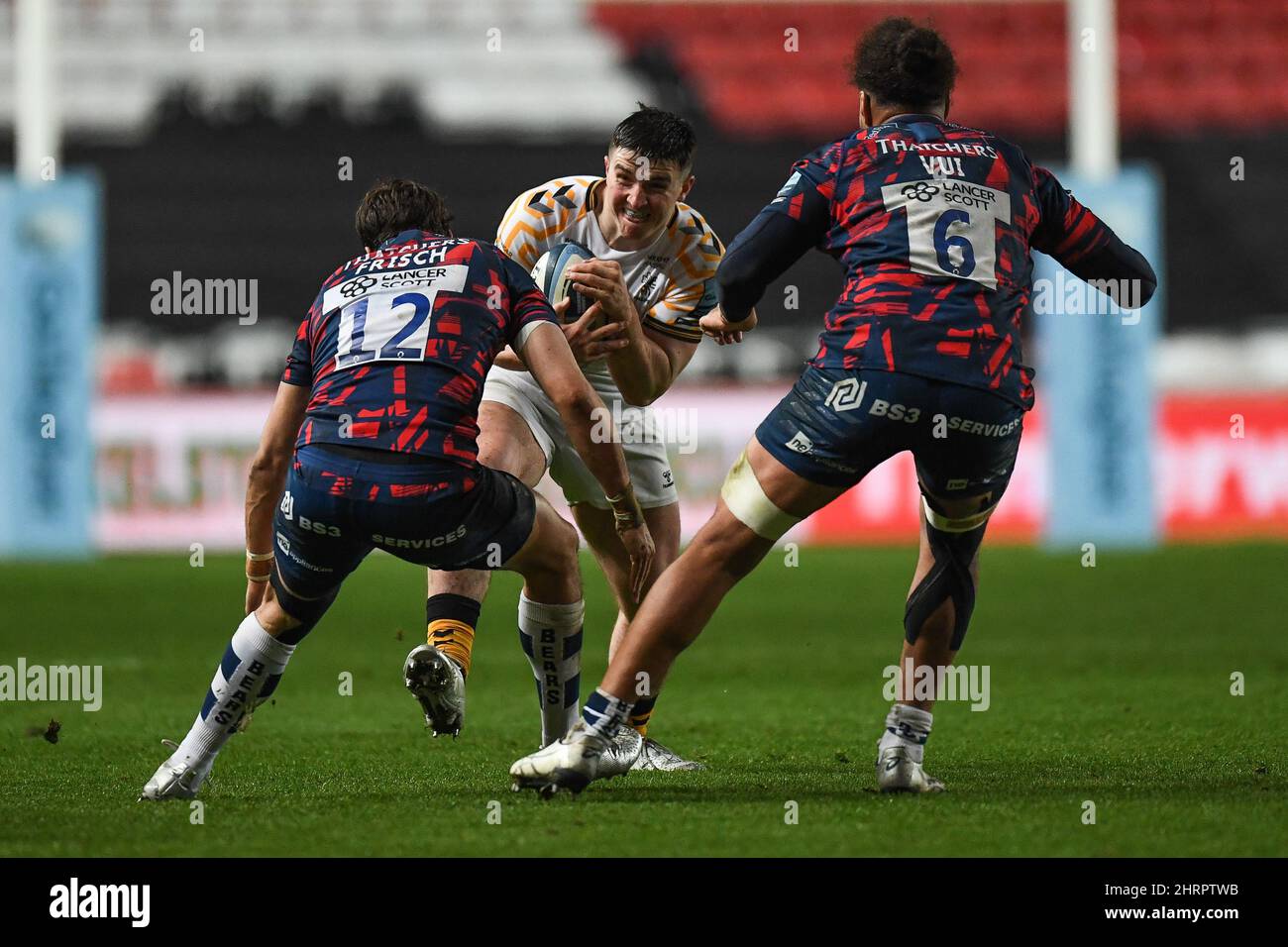 Sam Spink of Wasps Rugby, takes on Antoine Frisch of Bristol Bears, and ...
