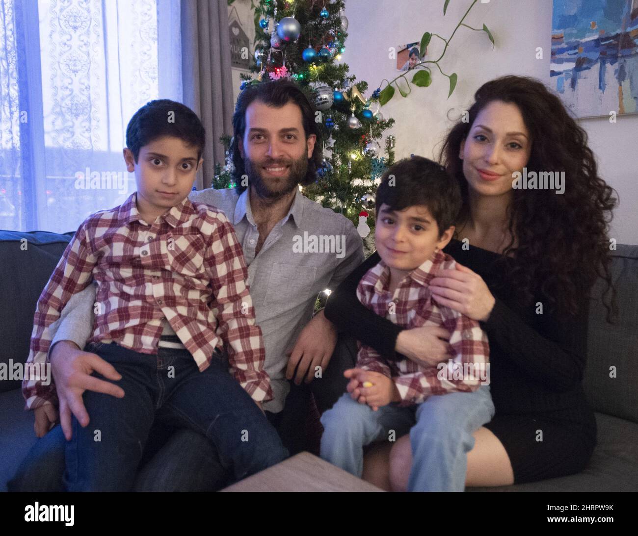 Ayham Abou Ammar and his wife Dima Naseraldeen pose for photos with ...