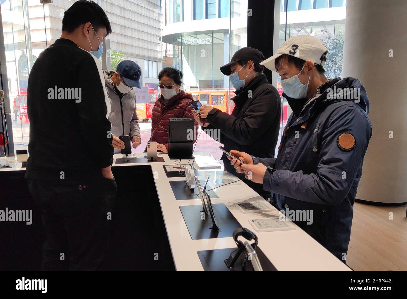 SHANGHAI, CHINA - FEBRUARY 25, 2022 - Customers experience Samsung S22 flagship series of mobile ...
