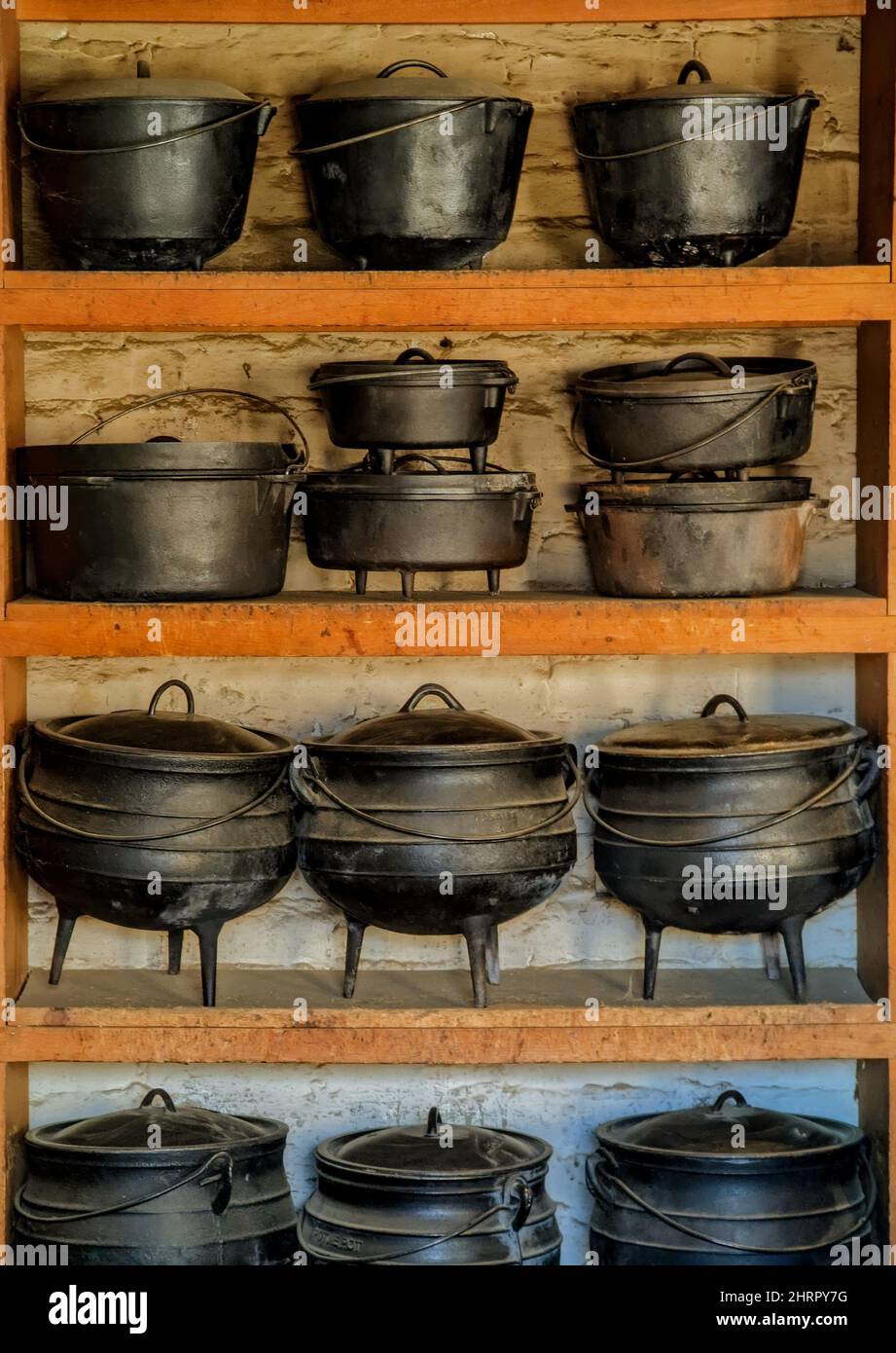 Three black cast iron pots hi-res stock photography and images - Alamy