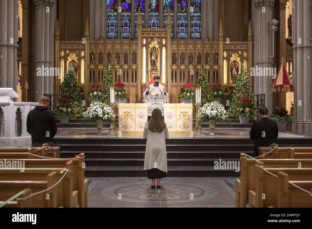 Father Ed Curtis performs Holy Communion services at St. Michael's ...