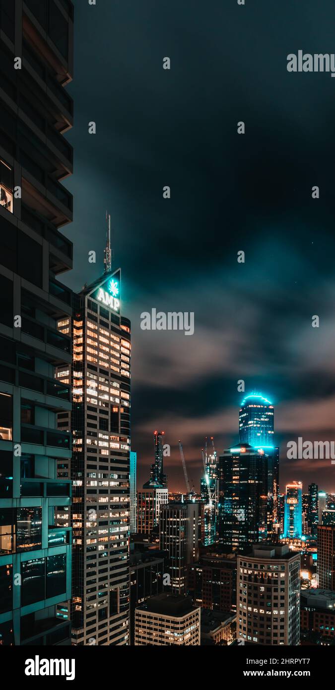 Vertical shot of the night sky and skyscrapers in Melbourne Stock Photo ...