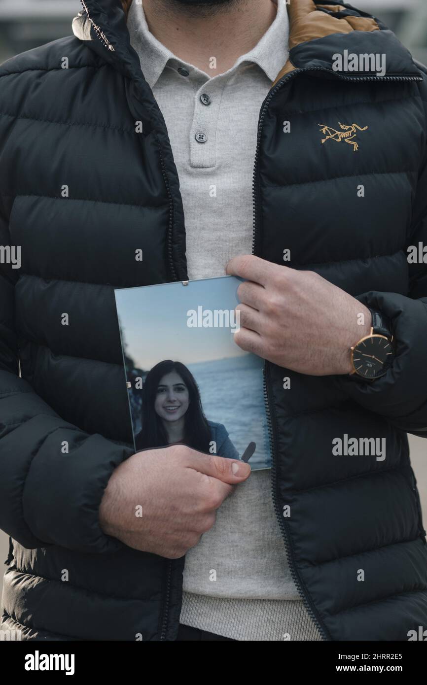 Daniel Ghods holds a photo of his girlfriend Saba Saadat, who died in ...