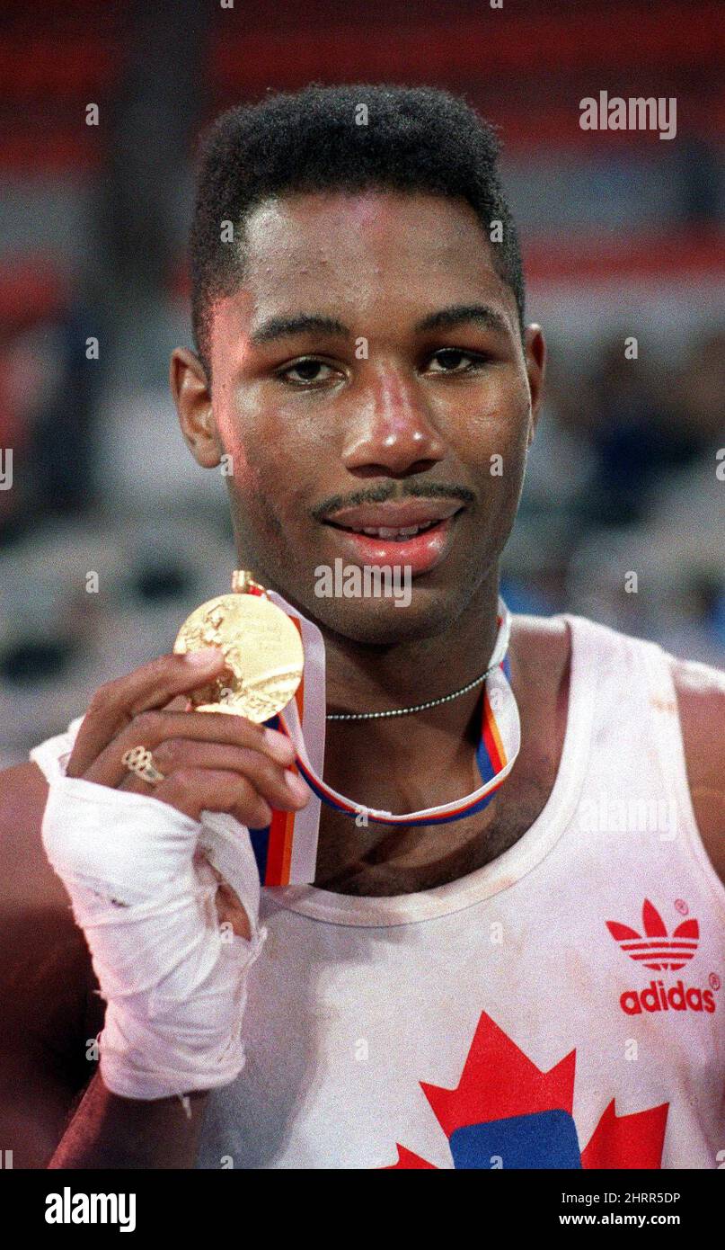 Canadian boxer Lennox Lewis displays his gold medal following the ...
