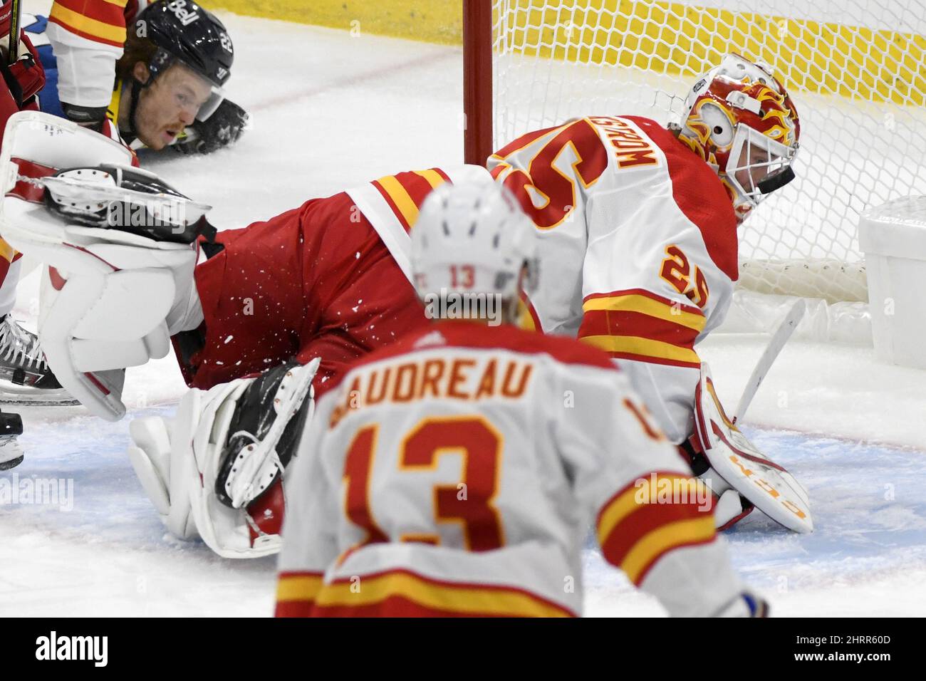 Calgary Flames goaltender Jacob Markstrom (25) is hit by the puck after a Winnipeg Jets shot ...