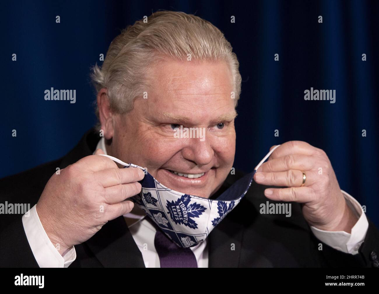 Ontario Premier Doug Ford puts on his Toronto Maple Leafs mask during ...