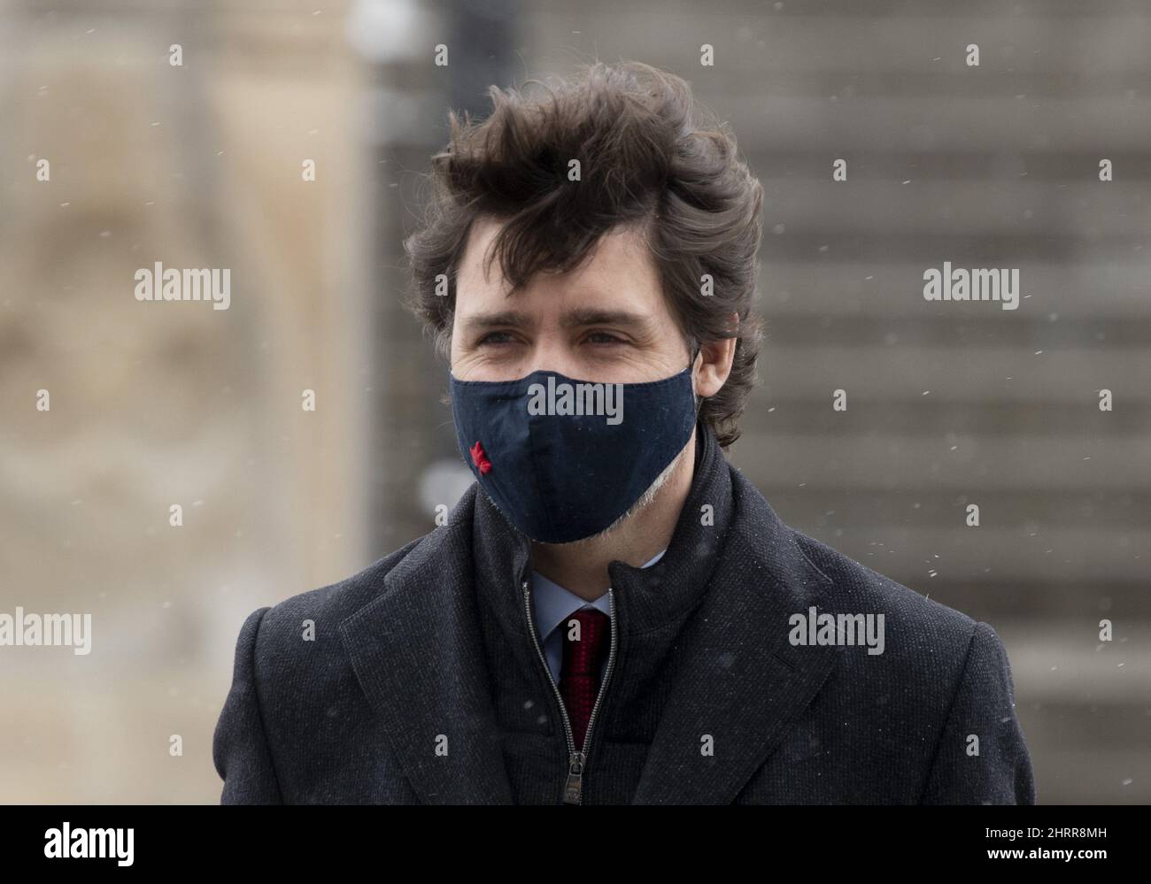 Prime Minister Justin Trudeau makes his way to a news news conference ...