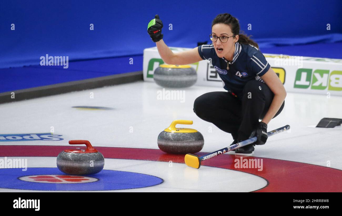 Team Nova Scotia skip Jill Brothers uses a mitten with green and red ...