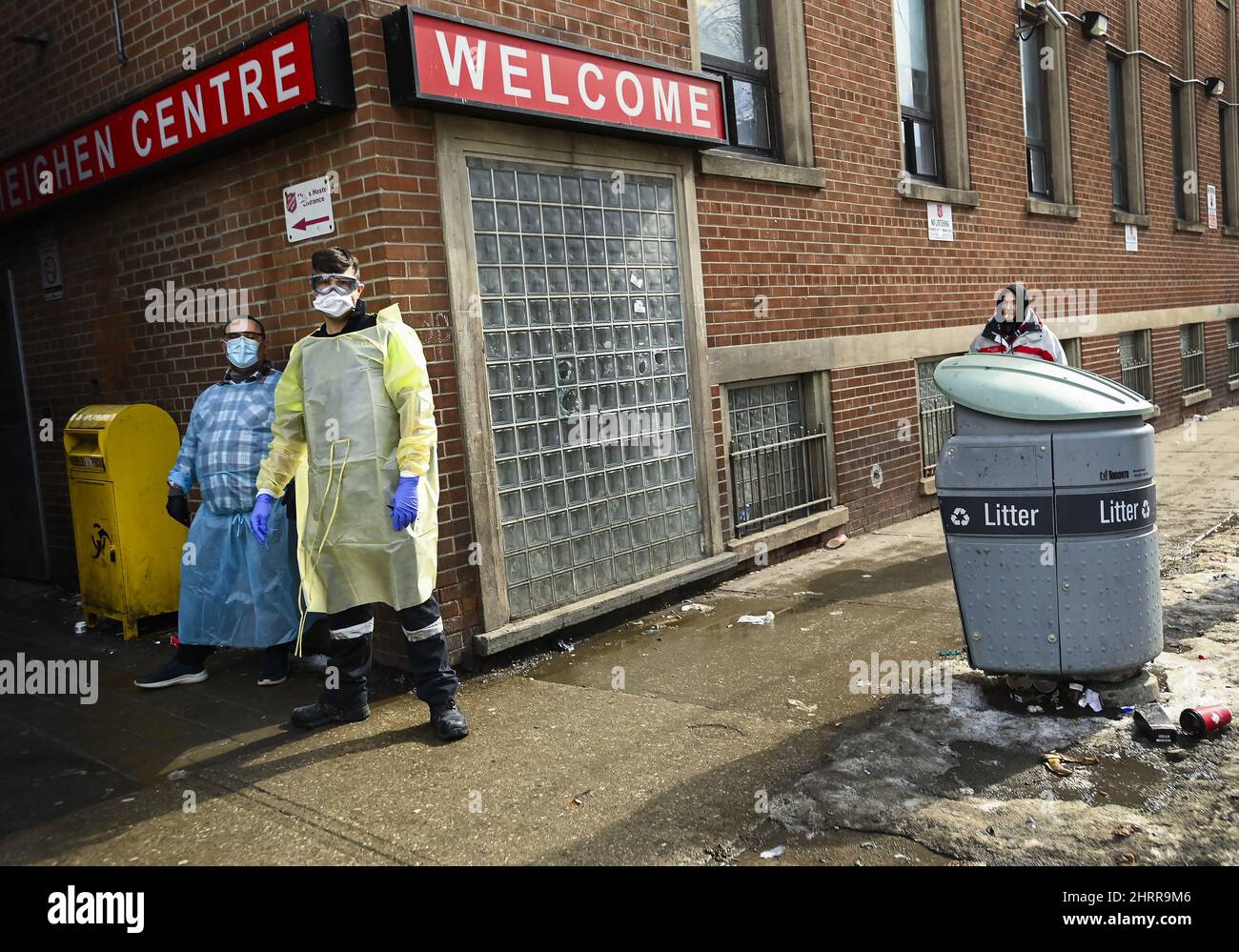 A worker and a paramedic stand outside the Maxwell Meighen Centre ...