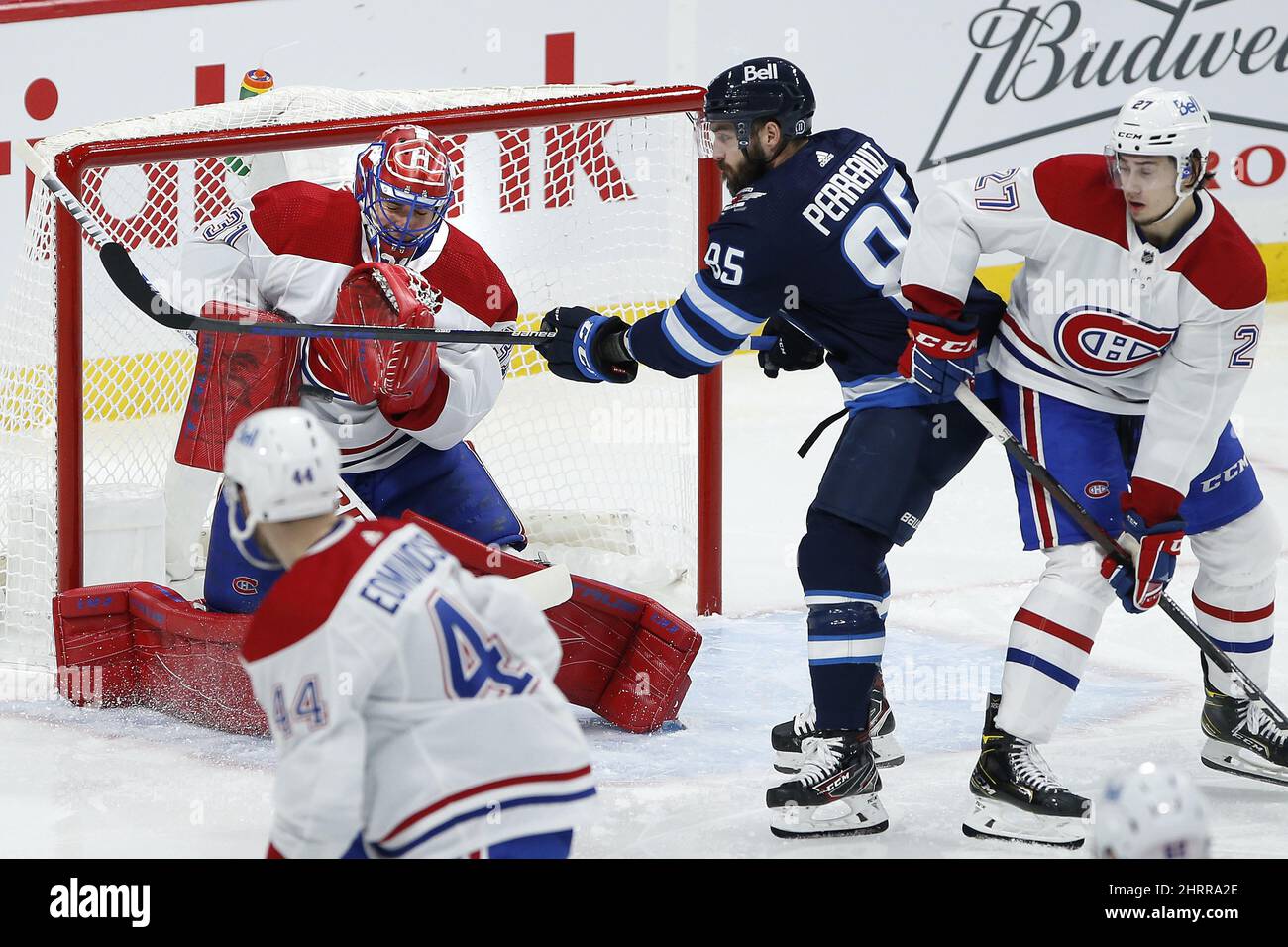 Winnipeg Jets' Mathieu Perreault (85) tries to tip the puck past ...