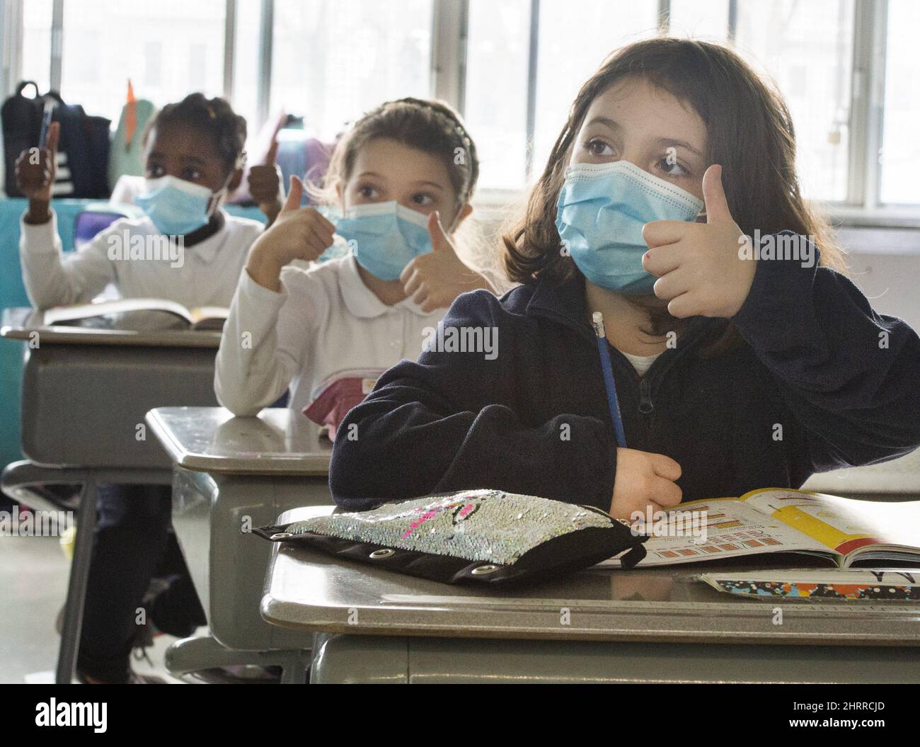 Grade one students wear masks as they attend class at Honore Mercier ...